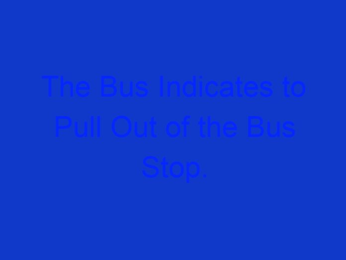 The Bus Indicates to Pull Out of the Bus Stop. Who Gives Way ...